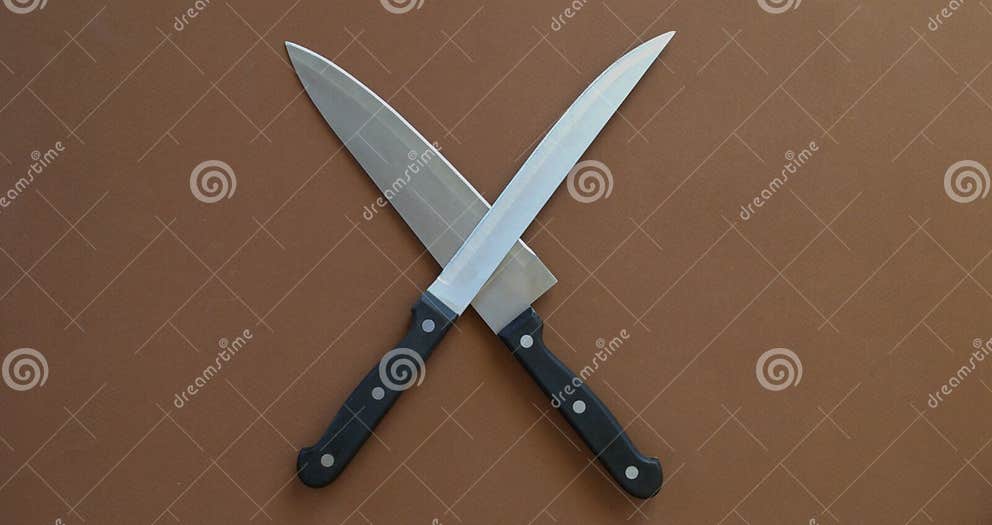 Two kitchen knives stock image. Image of knives, hand - 224410643