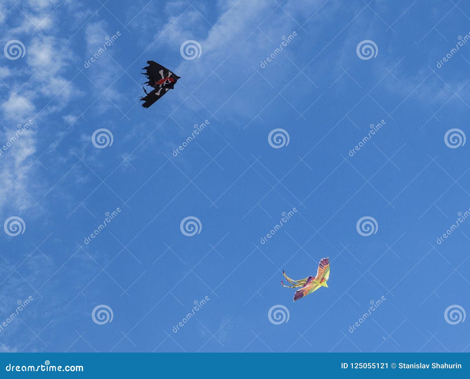 Two Colored Kites in the Sky with White Clouds Stock Image - Image of ...
