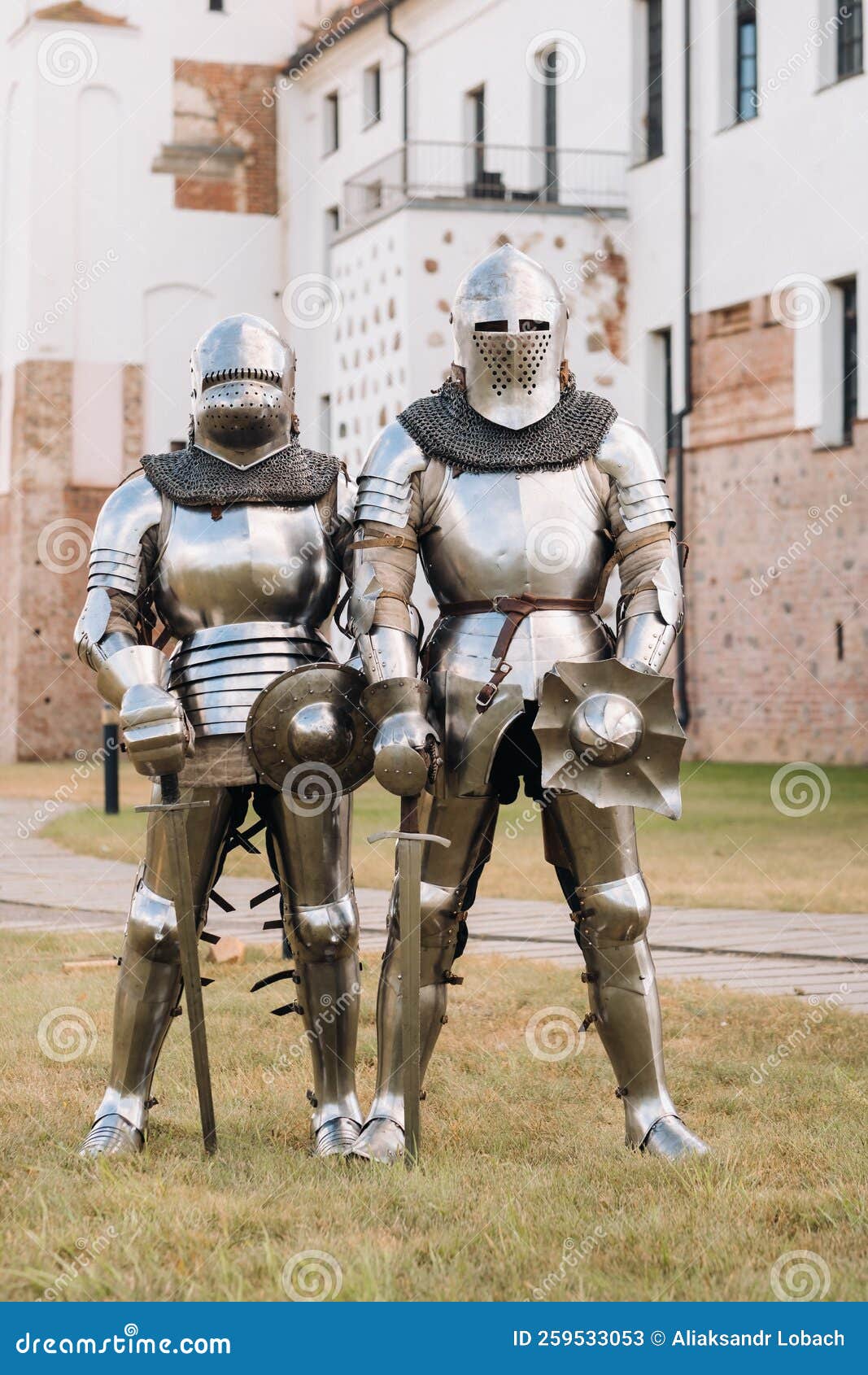 Two Knights in Ancient Metal Armor Stand at the Stone Wall of the ...