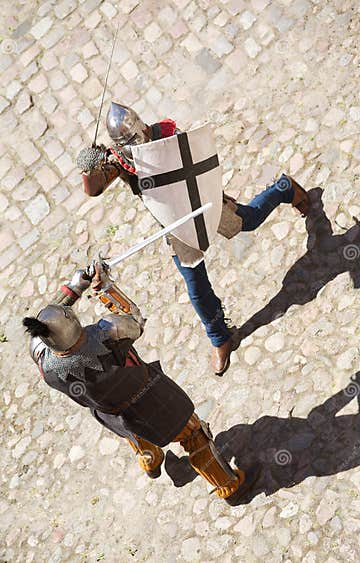 Two knights fighting stock photo. Image of costume, outside - 15110114