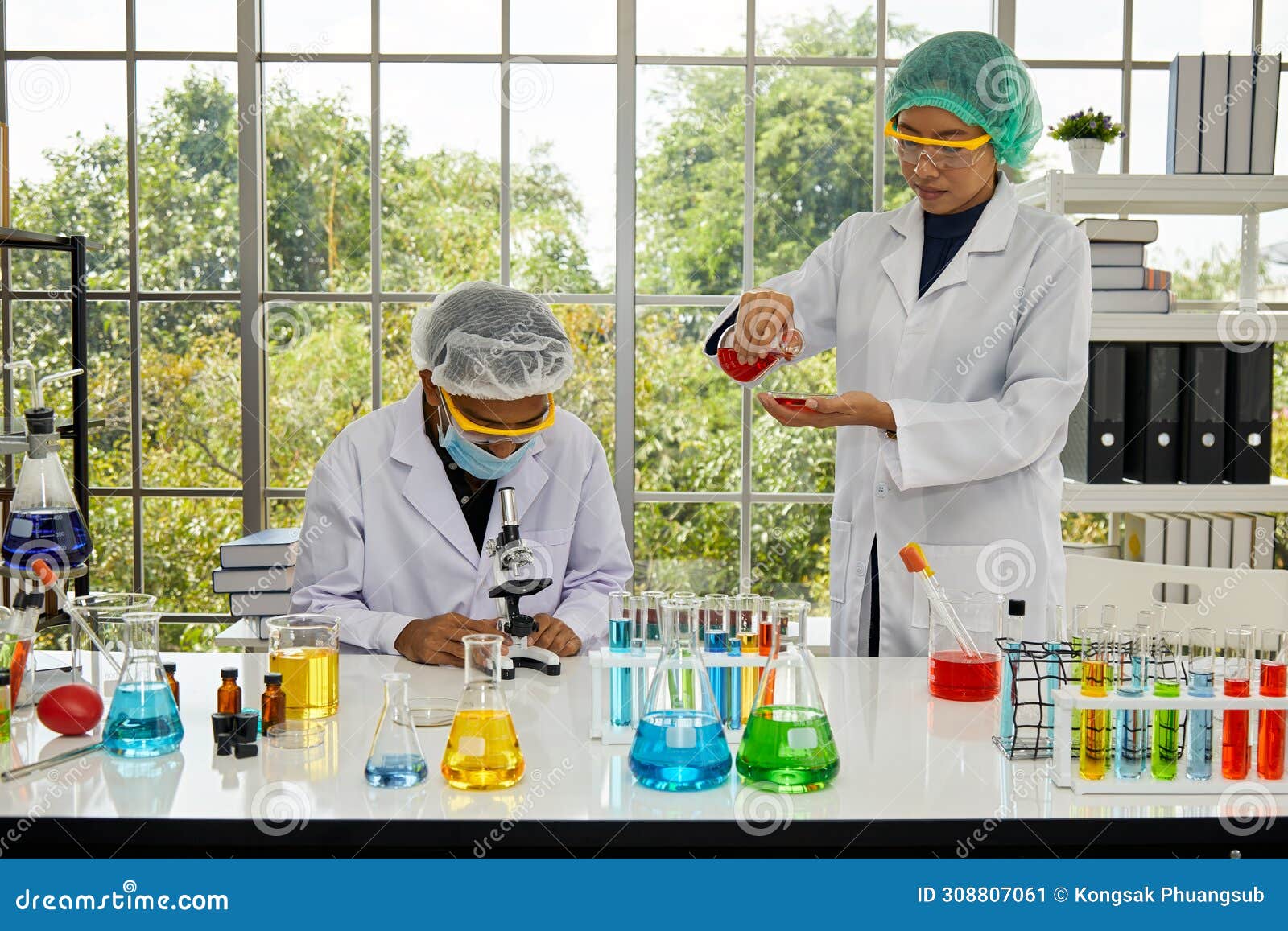 Two Laboratory Scientists Conducting Meticulous Performing Test and ...