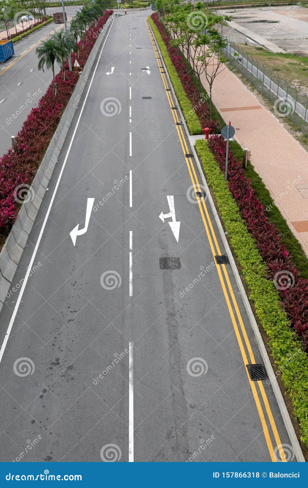 Two Lane Street stock photo. Image of arrows, urban - 157866318