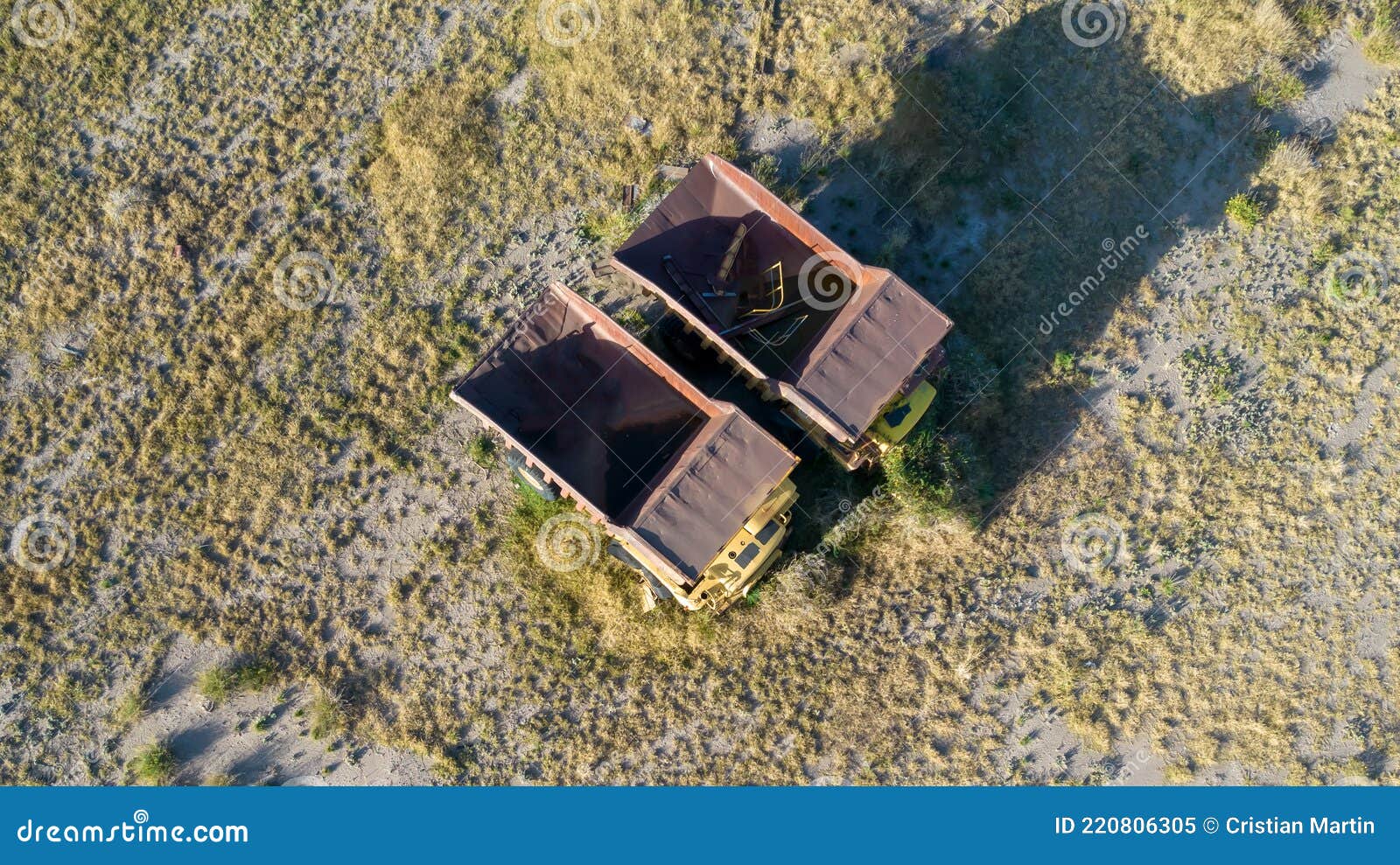 Two Large Abandoned Mining Trucks. Aerial View Stock Image - Image of ...