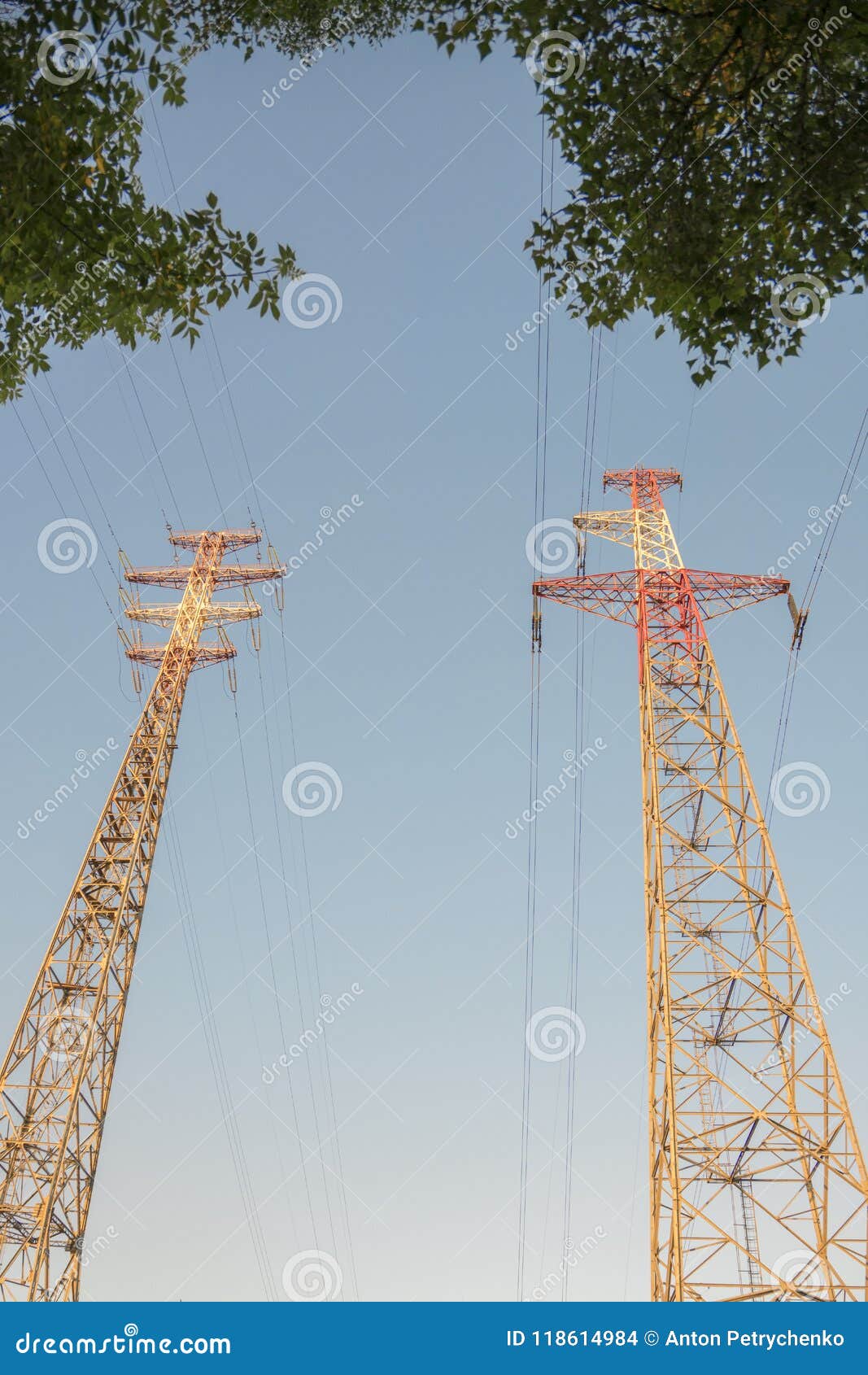 Two Large Rectangular High-voltage Electrical Transmission Towers with ...