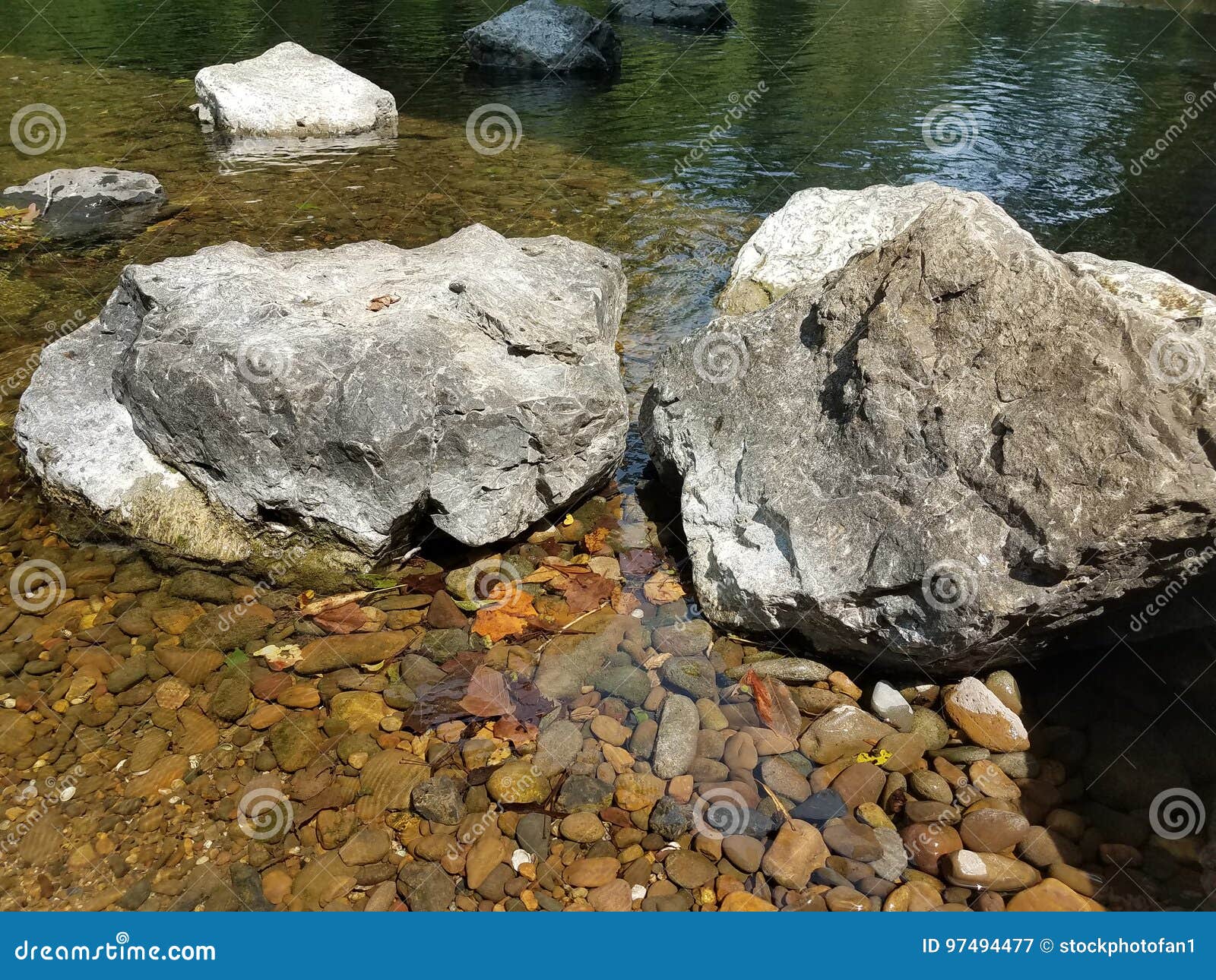 Two Large Rocks in a Stream Stock Image - Image of gray, stream: 97494477