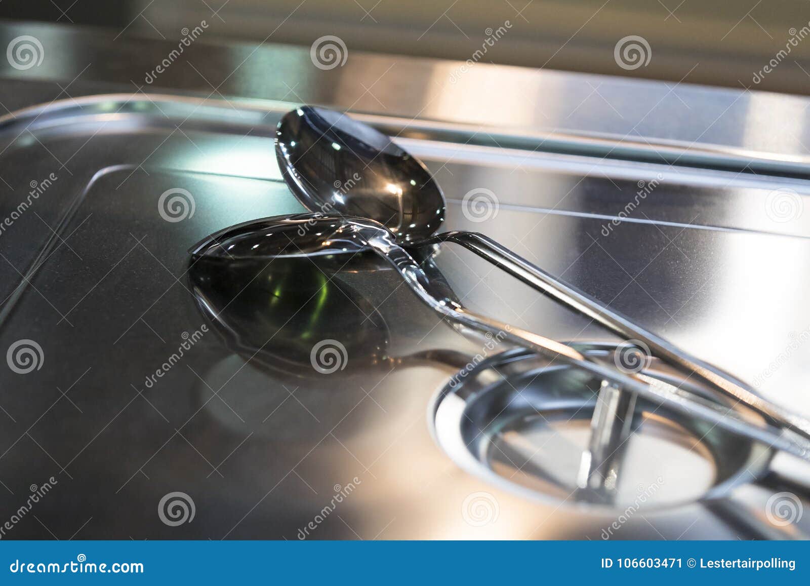 Two Large Spoons on an Iron Plate Kitchen Stock Image - Image of ...