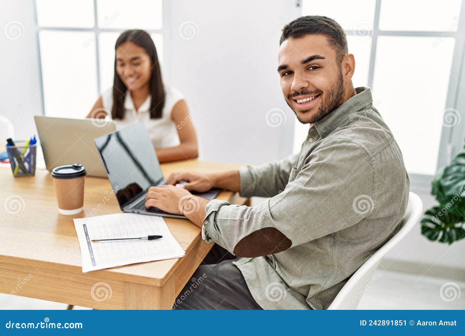 Two Latin Business Workers Smiling Happy Working at the Office Stock ...