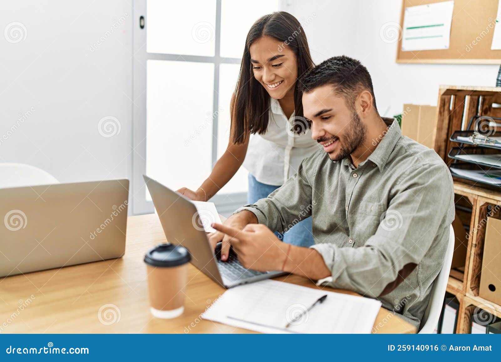 Two Latin Business Workers Smiling Happy Working at the Office Stock ...