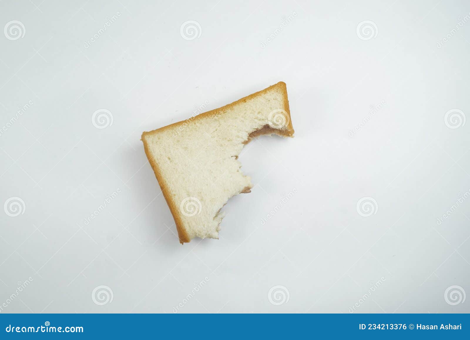 Two Layers of White Bread with Bite Marks on a White Background Stock ...