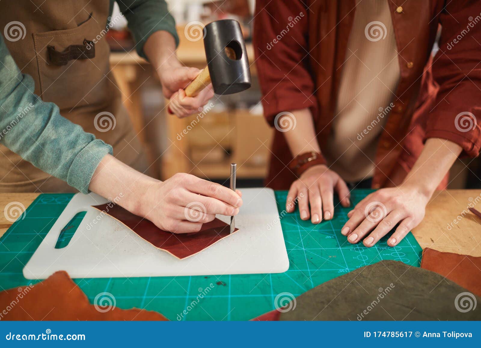 Two Leather Craft Workers stock image. Image of working - 174785617