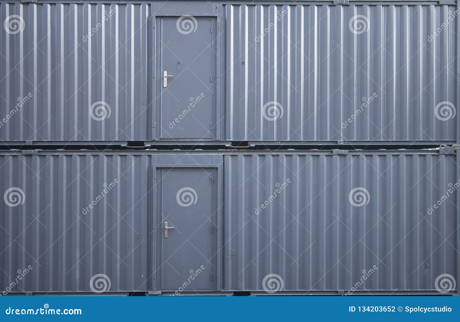 Two Level Metal Warehouse Wall with Closed Doors. Background Photo ...