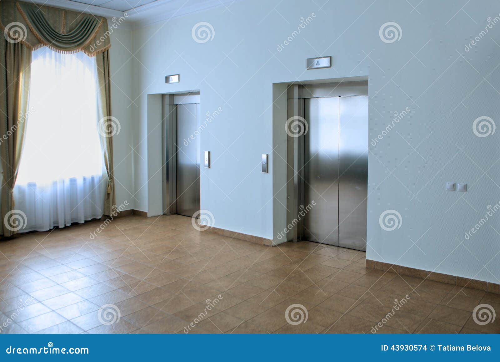 Two lifts in a hotel hall stock photo. Image of architecture - 43930574