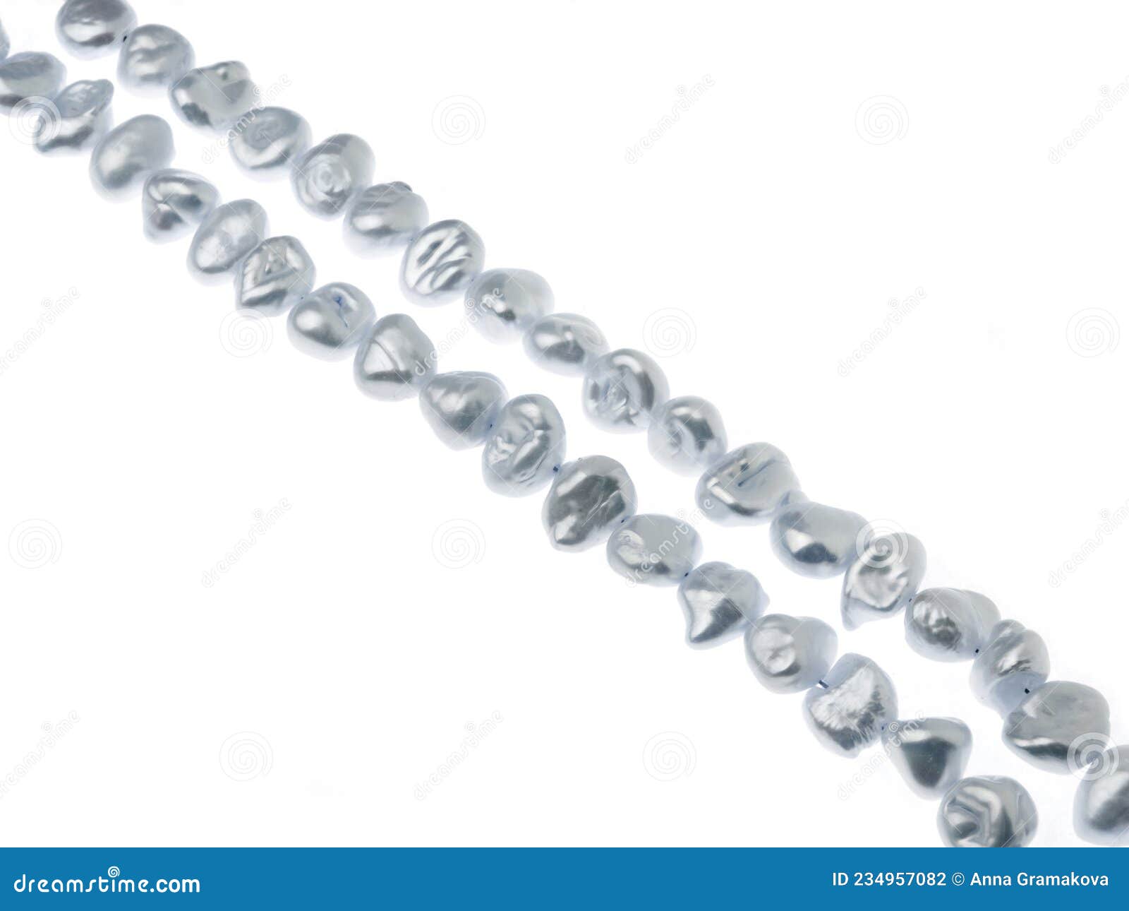 Lines Of Baroque Pearls And Metal Chain On Beige Leather Background ...