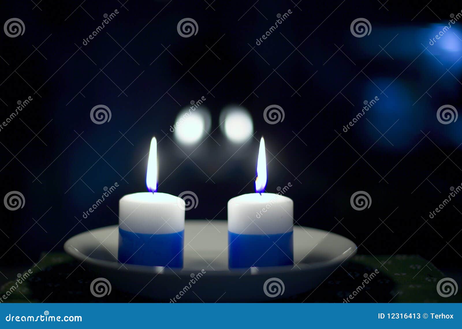 Two lit candles stock image. Image of home, light, fire - 12316413