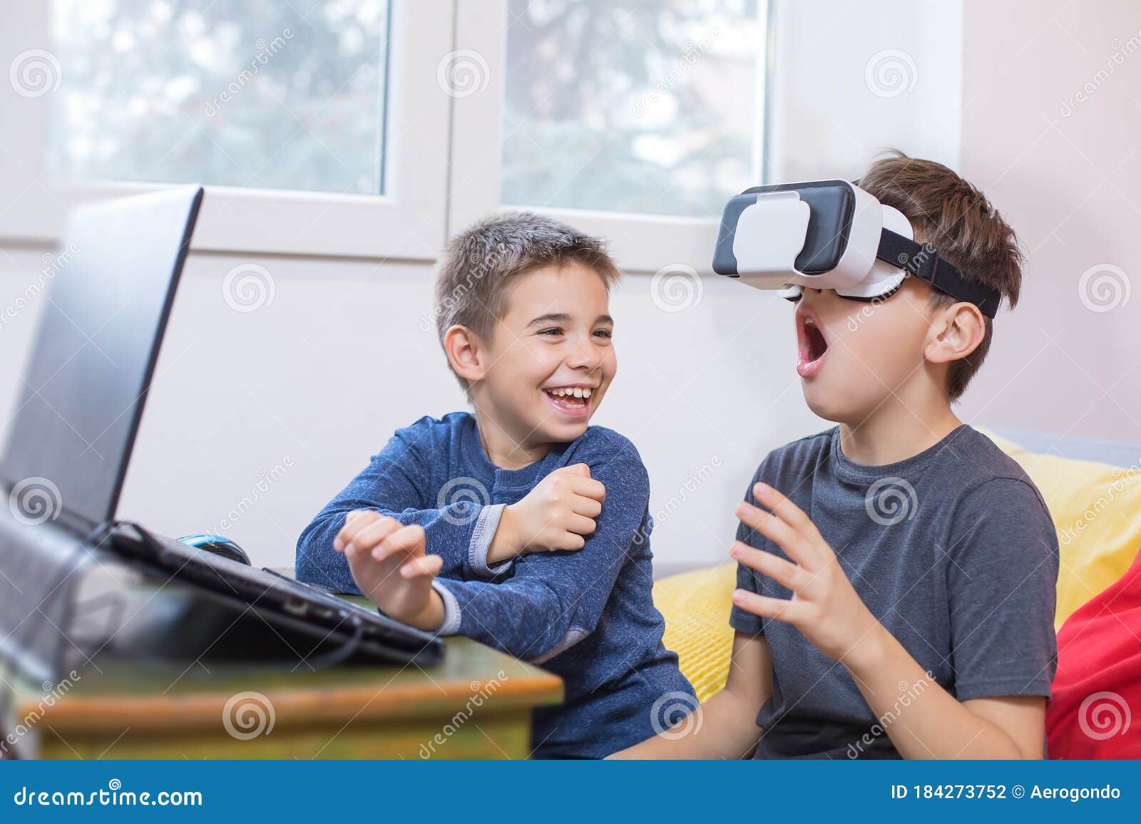 Two Little Boys Playing Games on Computer Stock Photo - Image of child ...