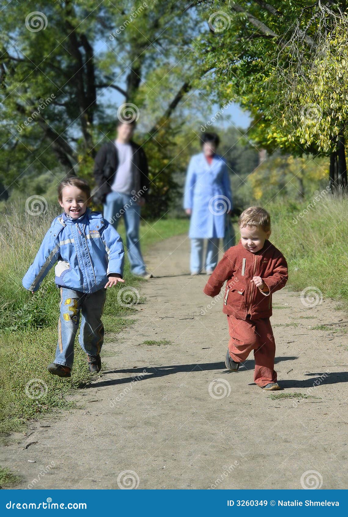 Two little boys running stock image. Image of color, colorful - 3260349