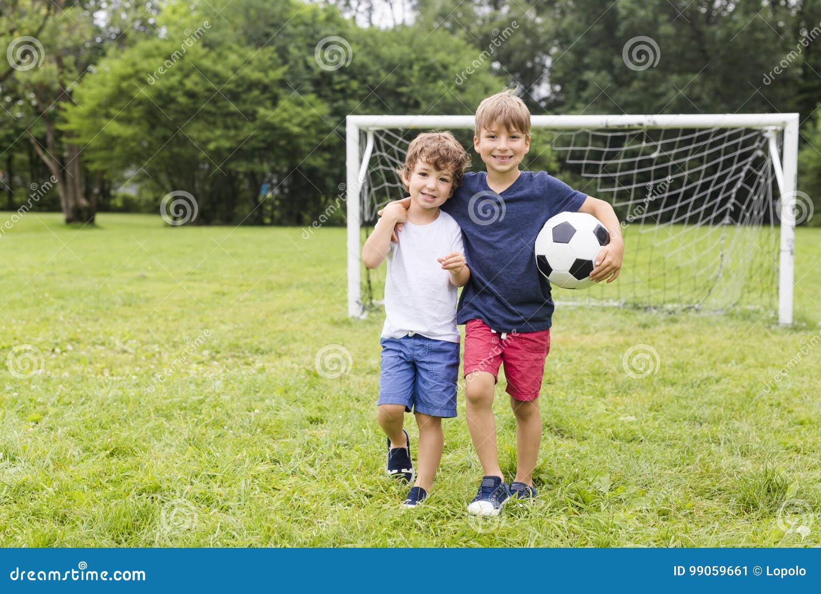 Two Brothers Having Fun Playing with Ball Stock Image - Image of ...