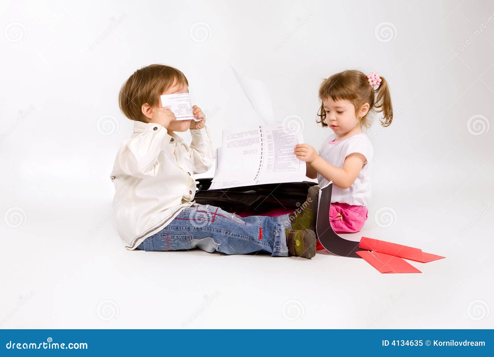 Two Little Chuldren Playing with Papers Stock Image - Image of ...