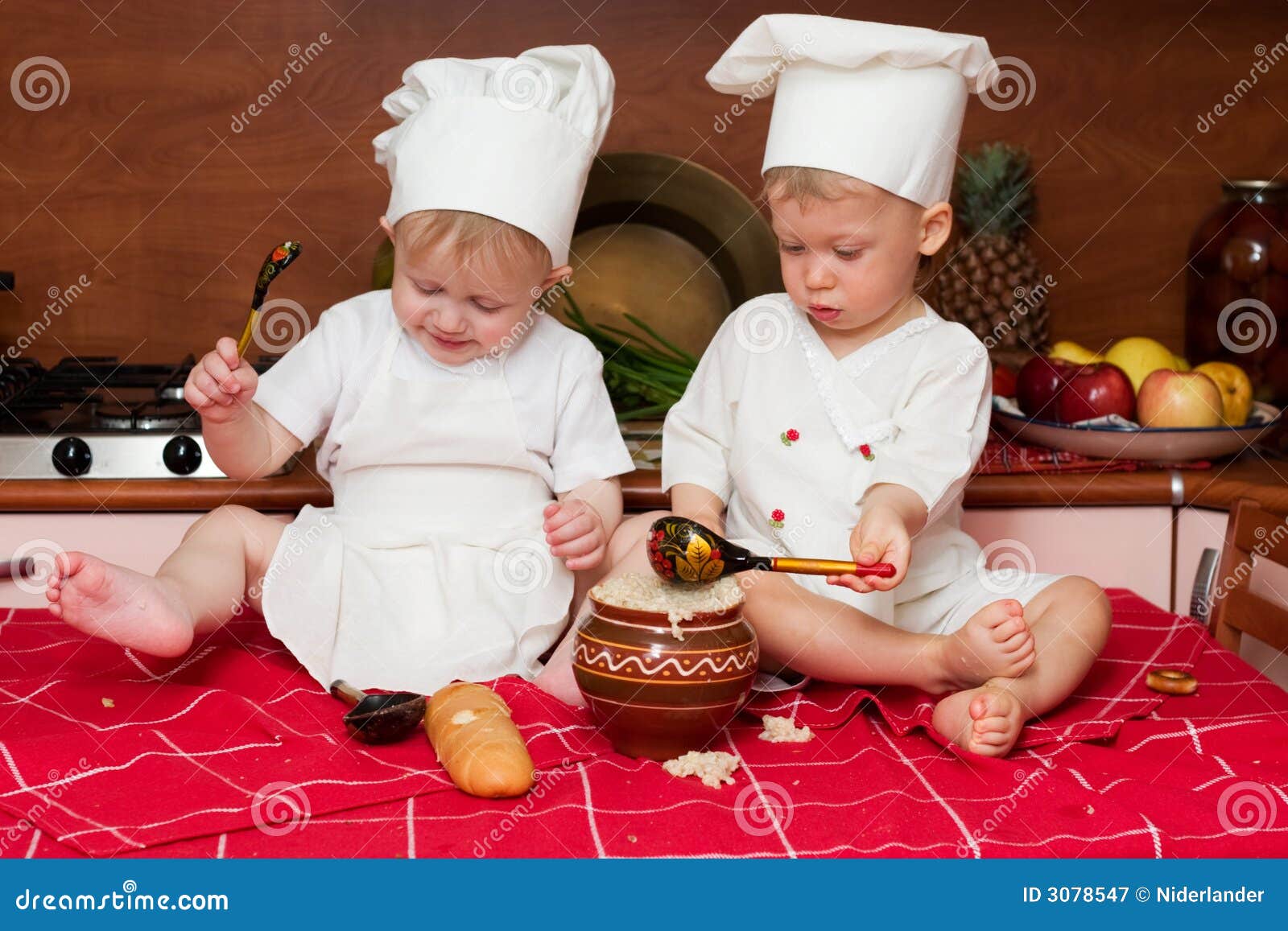 Two little cooks stock image. Image of bread, children - 3078547