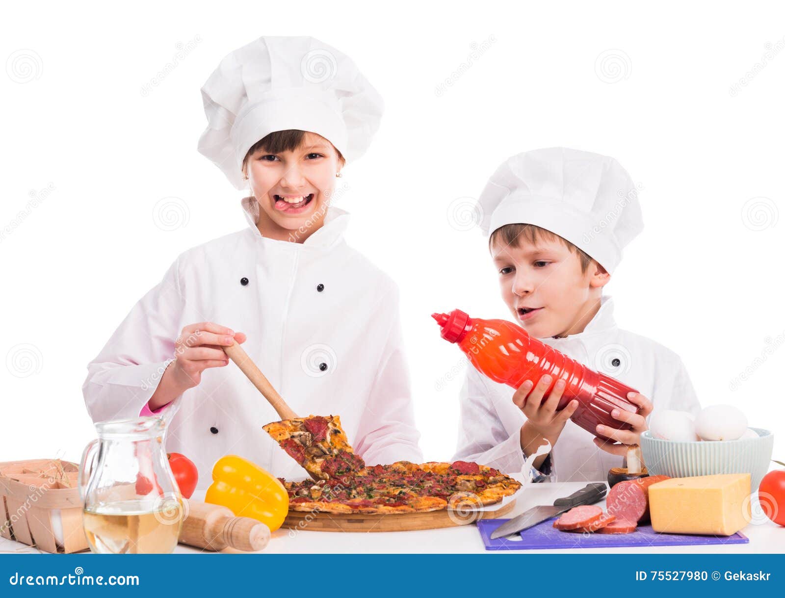 Two Little Cooks Portioning Cooked Pizza Stock Photo - Image of cooking ...