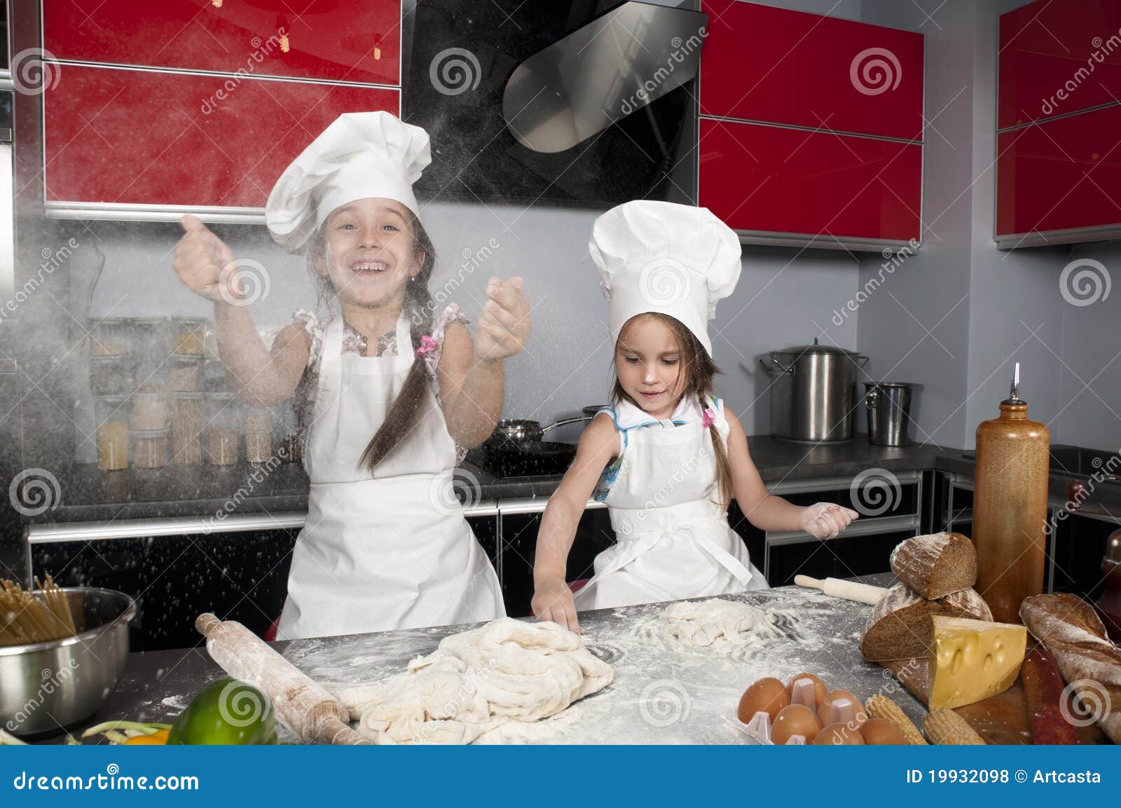 Two little girl cook stock photo. Image of dinner, girl - 19932098