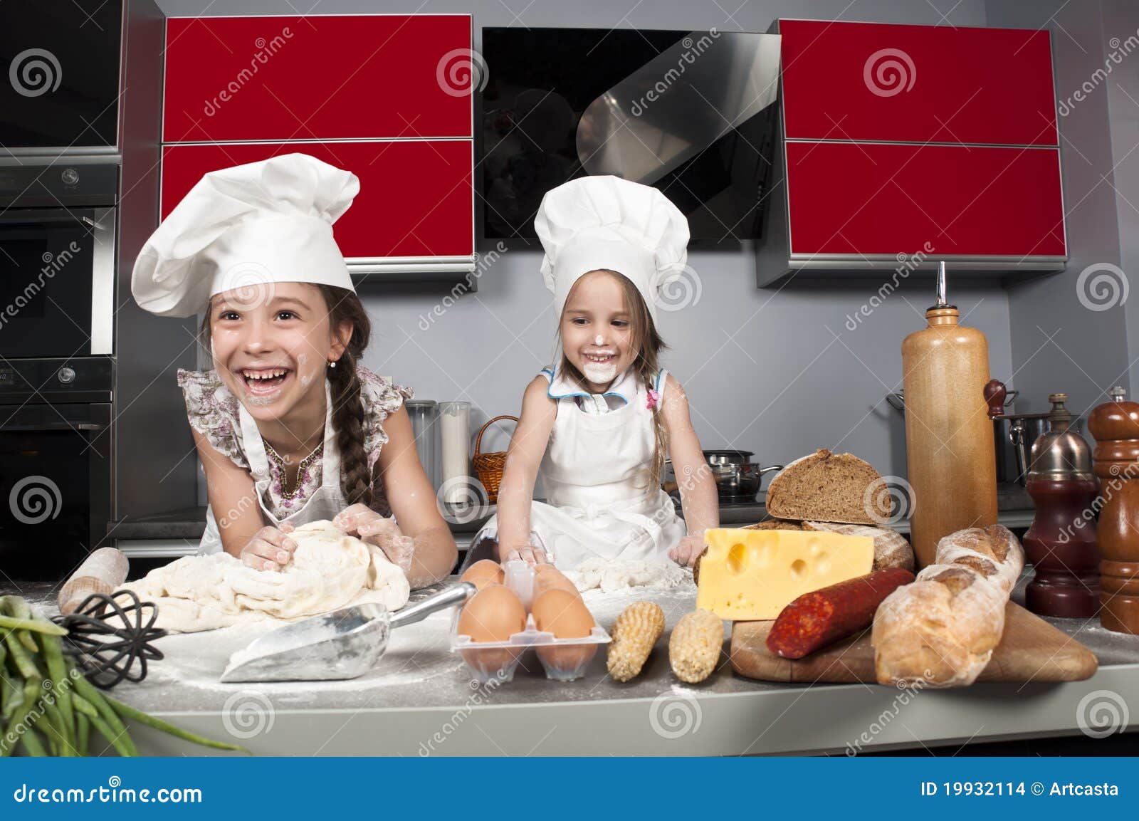Two little girl cook stock photo. Image of drink, domestic - 19932114