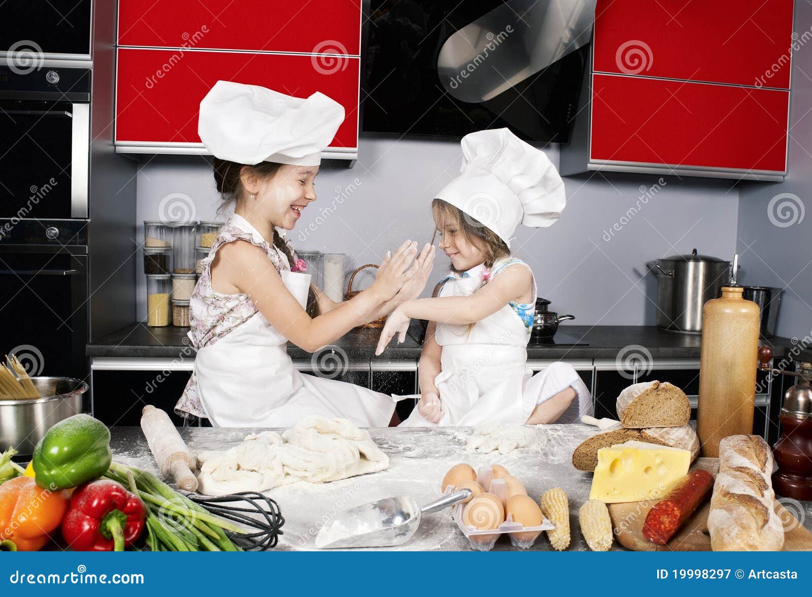 Two little girl cook stock image. Image of domestic, cheese - 19998297