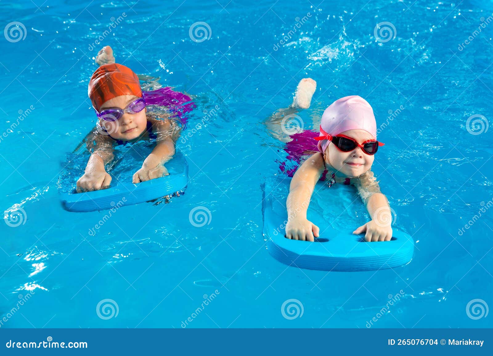 Two Little Girls Having Fun in Pool Learning How To Swim Using Flutter ...