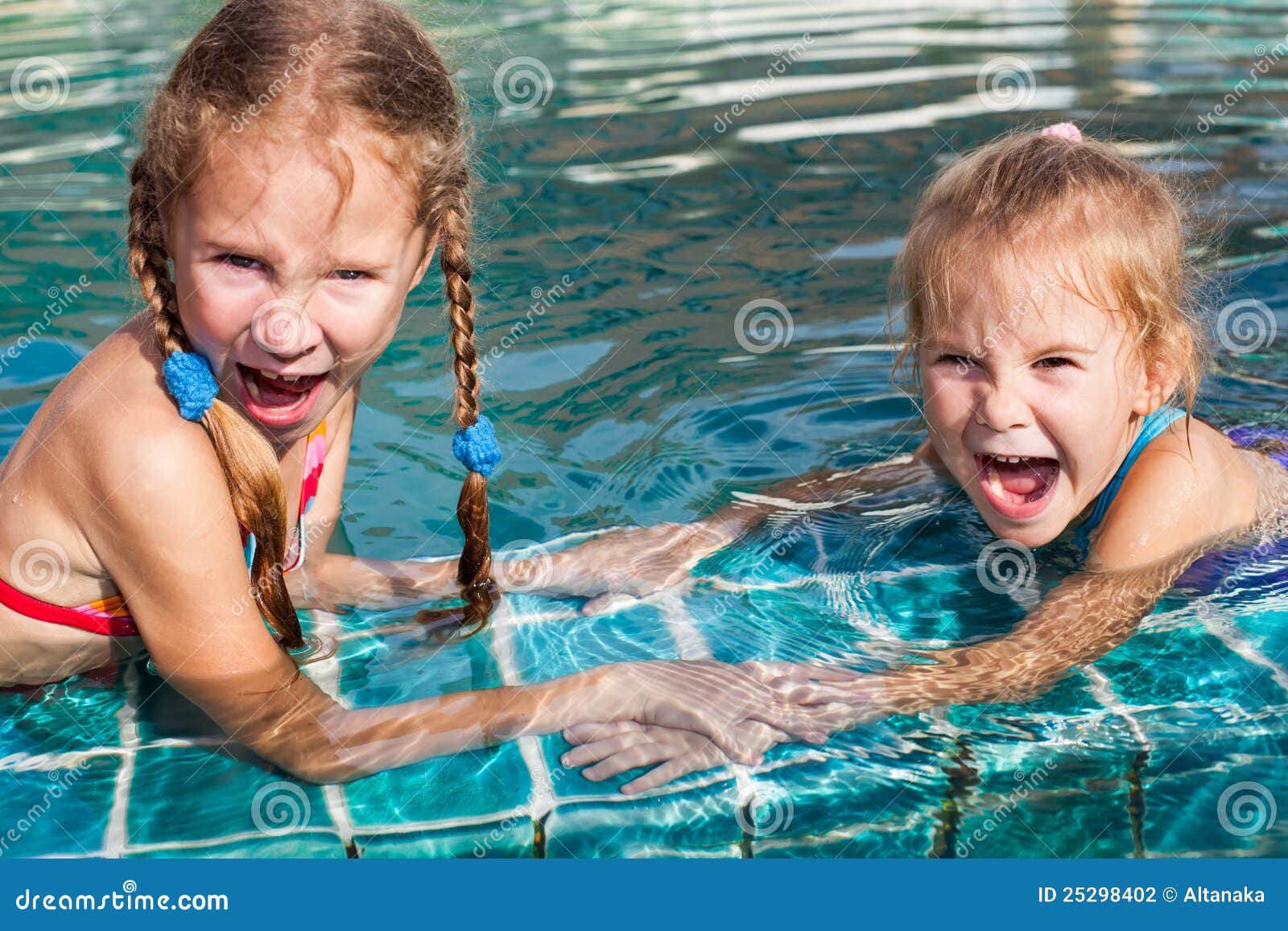 Two Little Girls Playing in the Pool Stock Photo - Image of activity ...