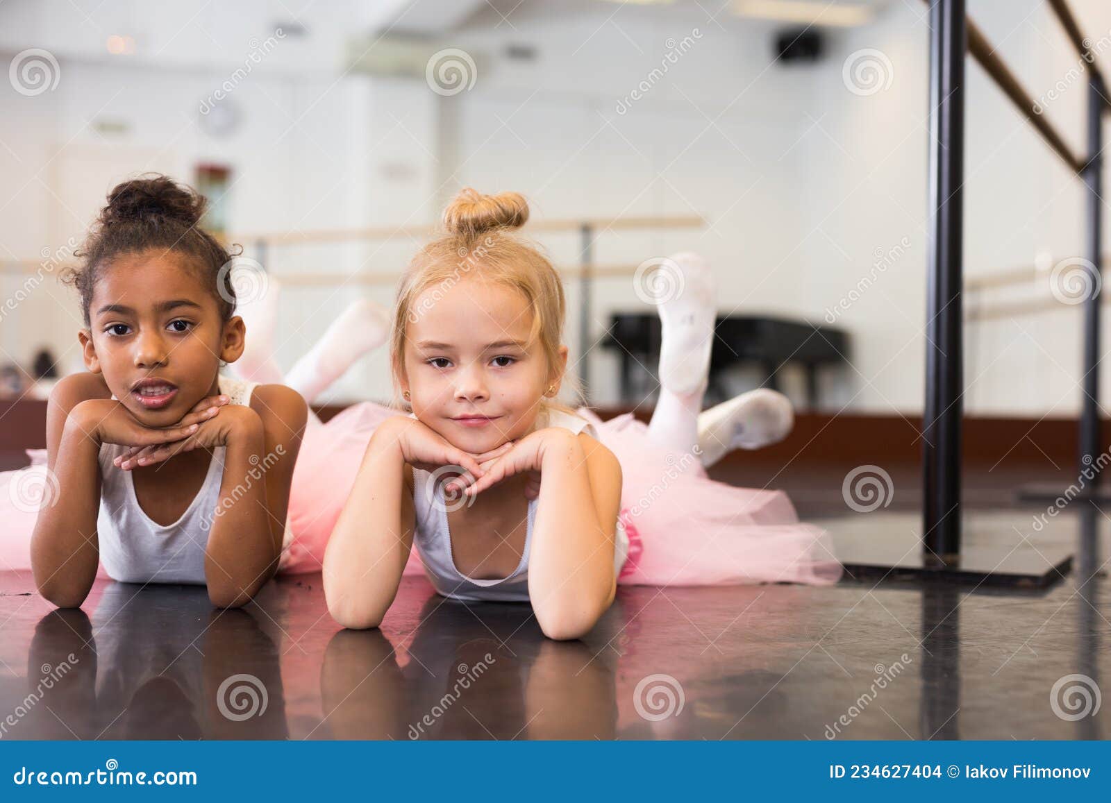 Two Little Girls Practicing Ballet Elements Stock Photo - Image of ...