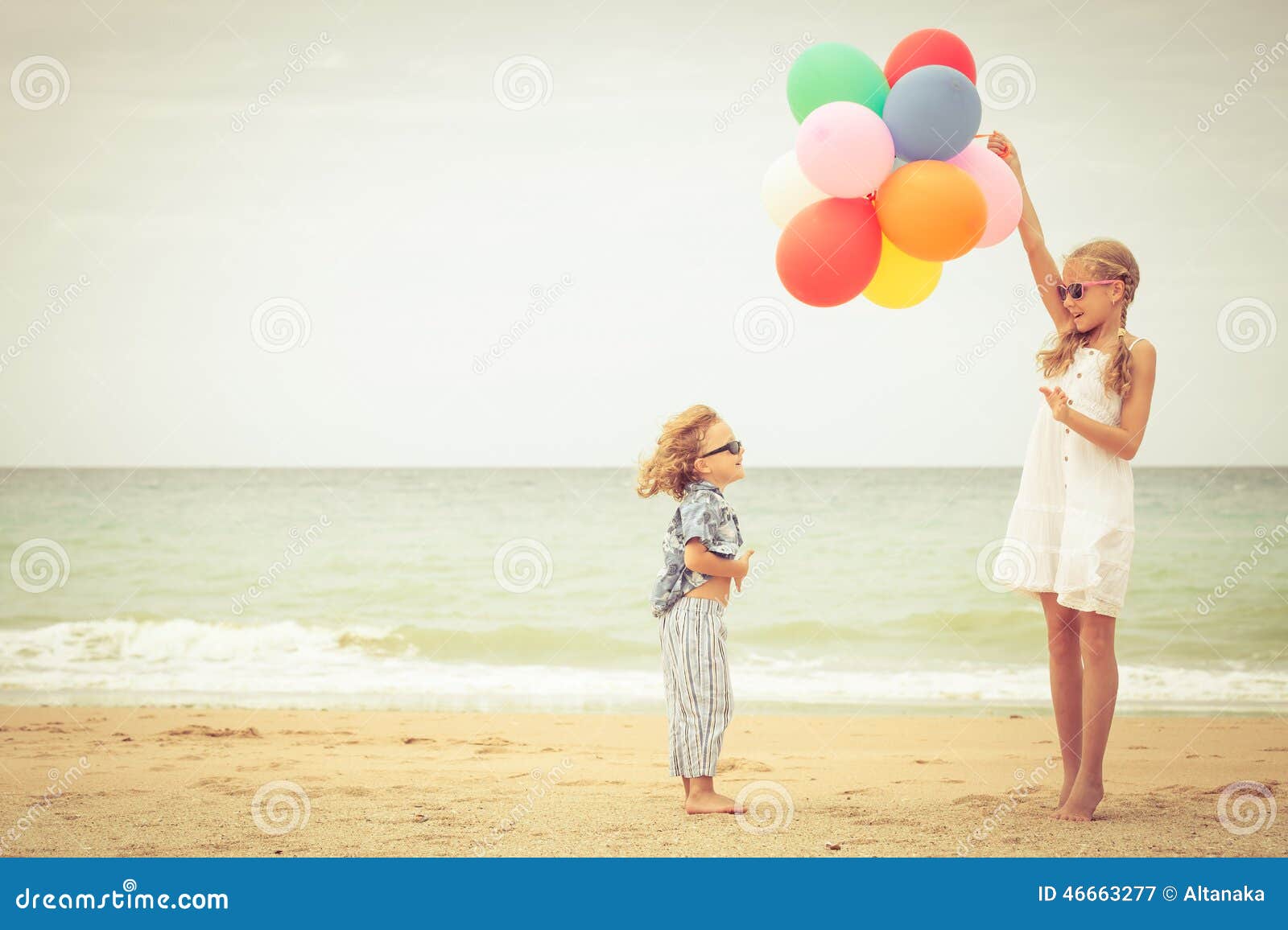 Two Little Kids with Balloons Standing on the Beach Stock Image - Image ...