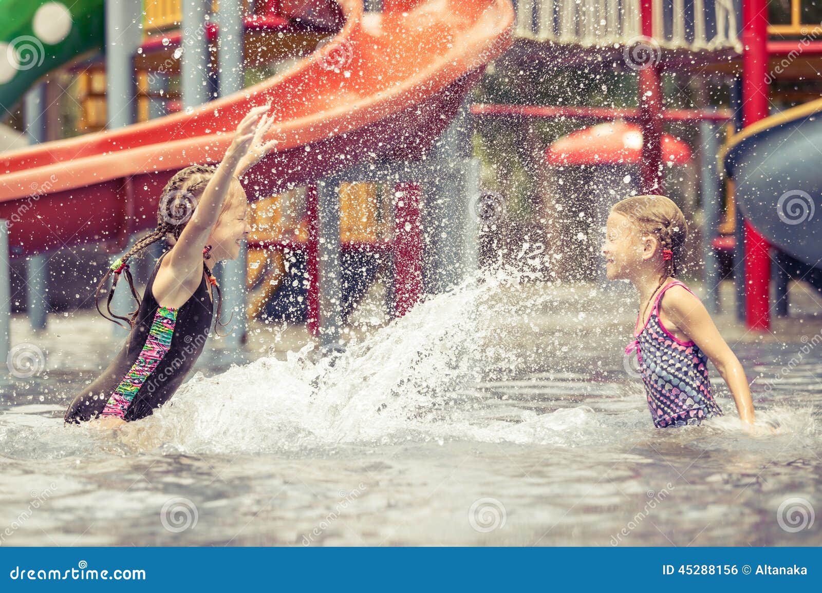 Two Little Kids Playing in the Swimming Pool Stock Photo - Image of ...