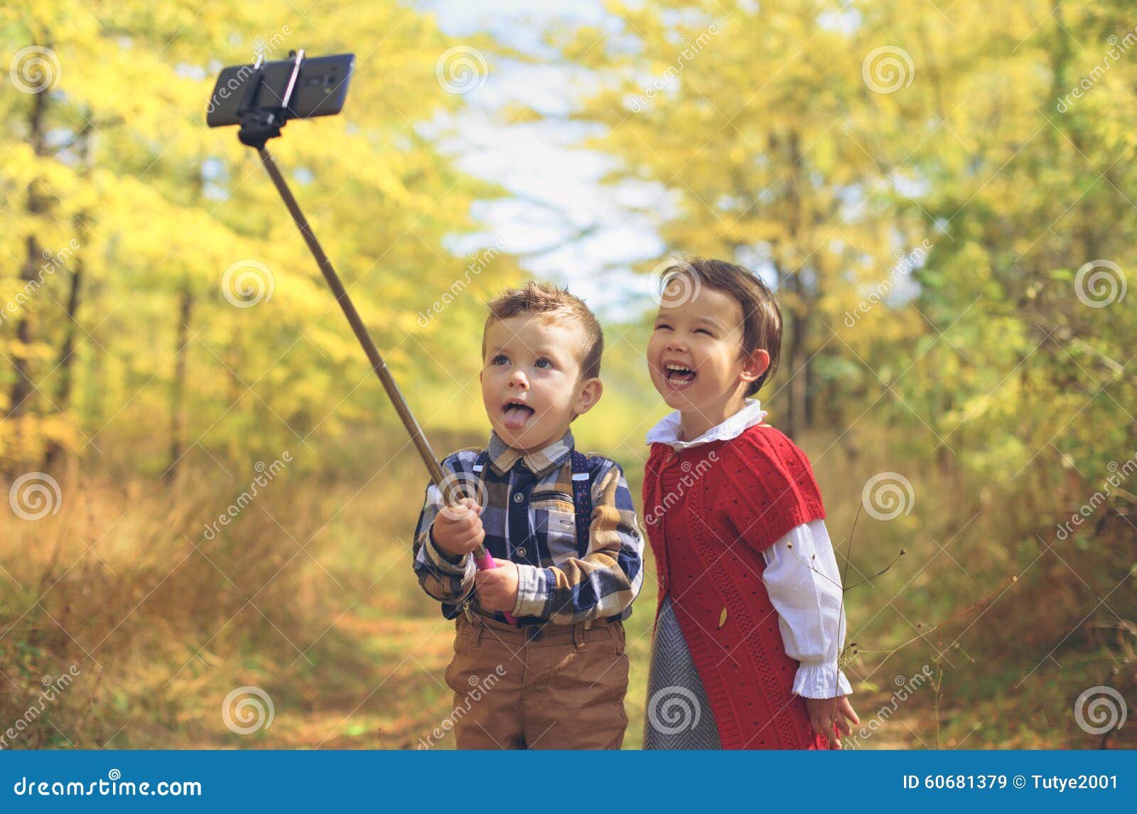 Two Little Kids Taking Selfie In The Park Stock Image | CartoonDealer ...