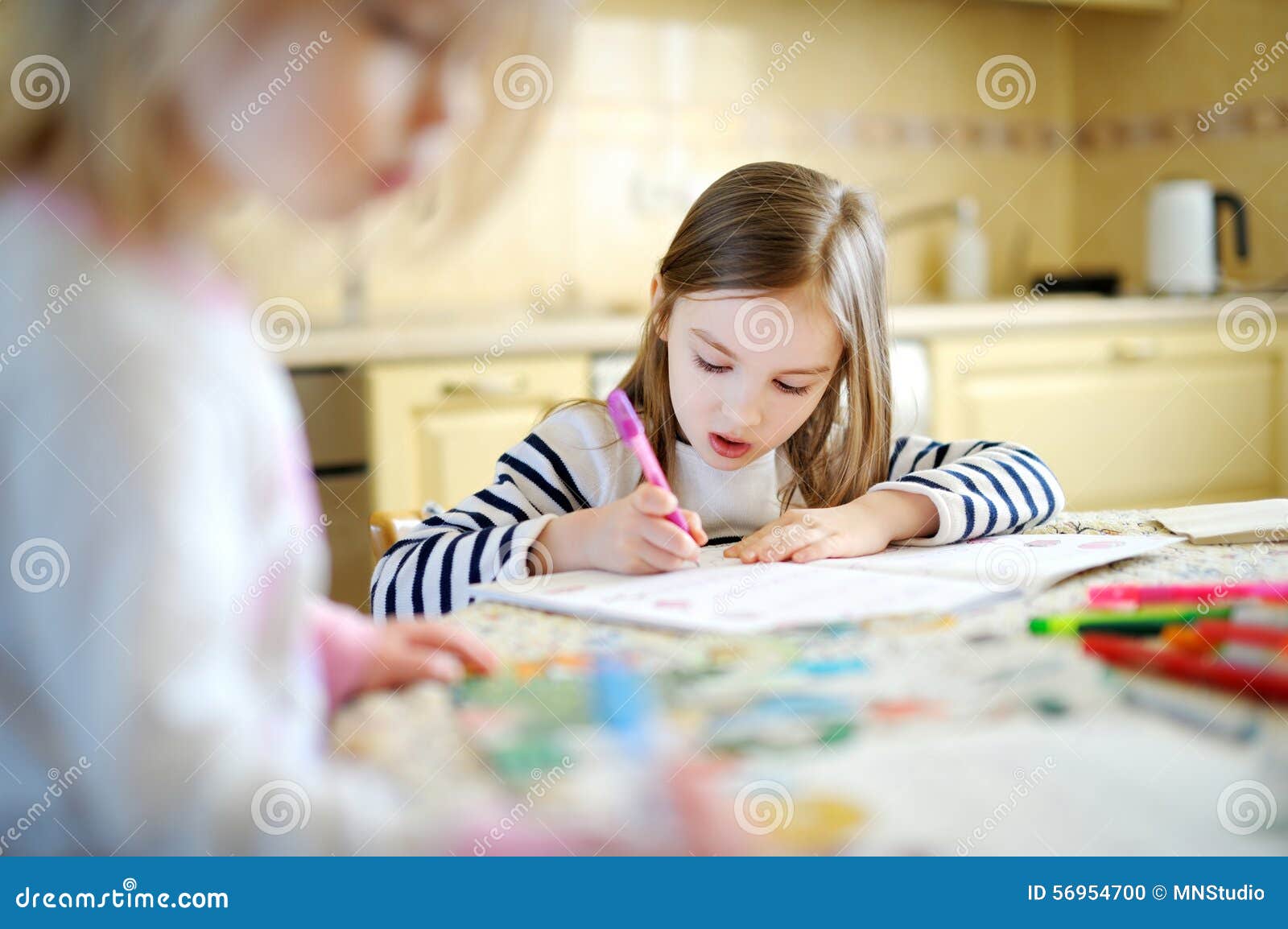 Two Little Sisters Drawing and Learning Together Stock Photo - Image of ...