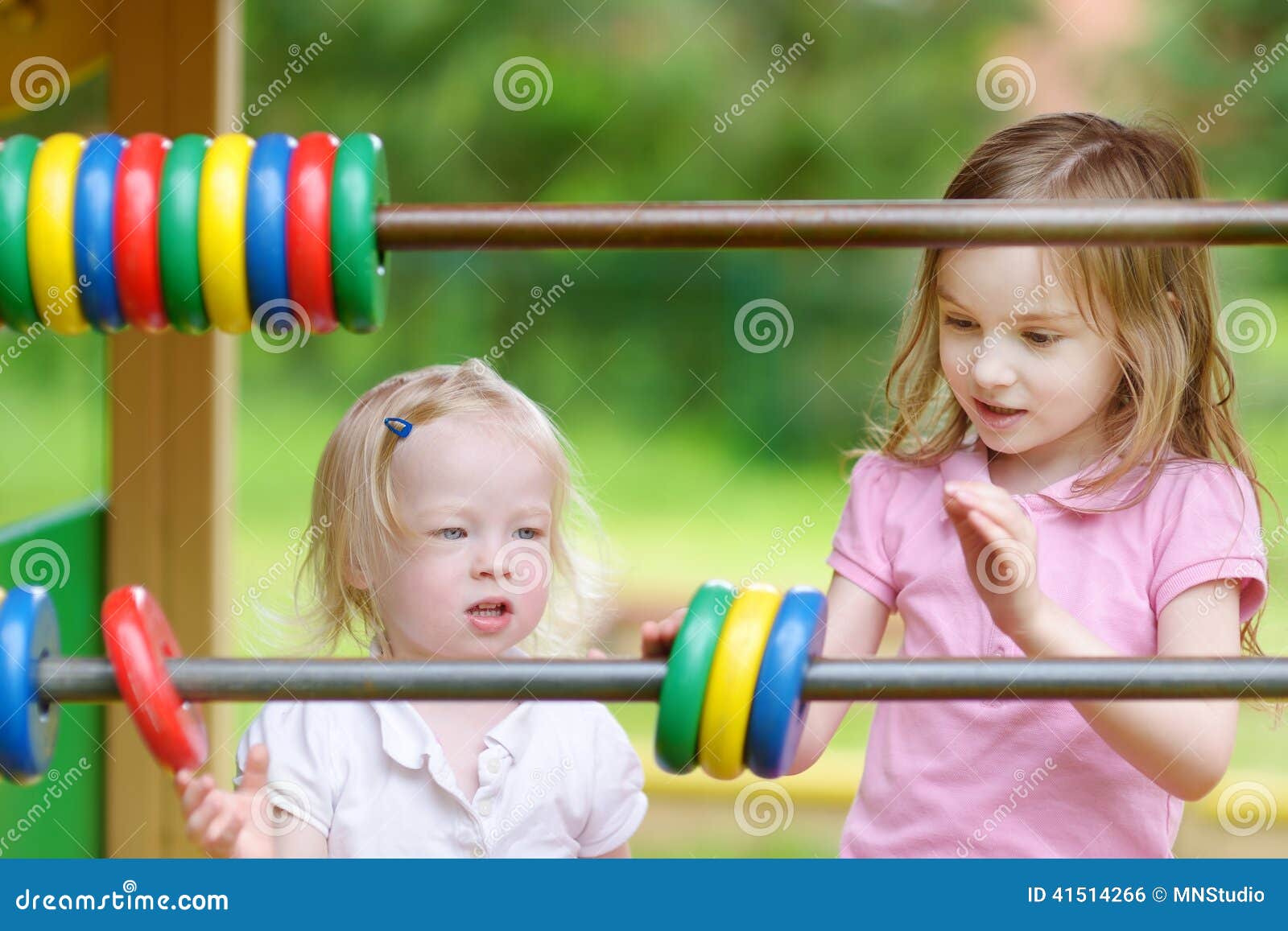 Two Little Sisters Learning To Count Stock Photo - Image of abacus ...