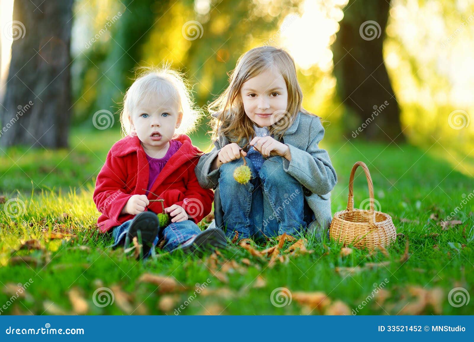 Two Little Sisters Playing Outside Stock Photo - Image of alley ...