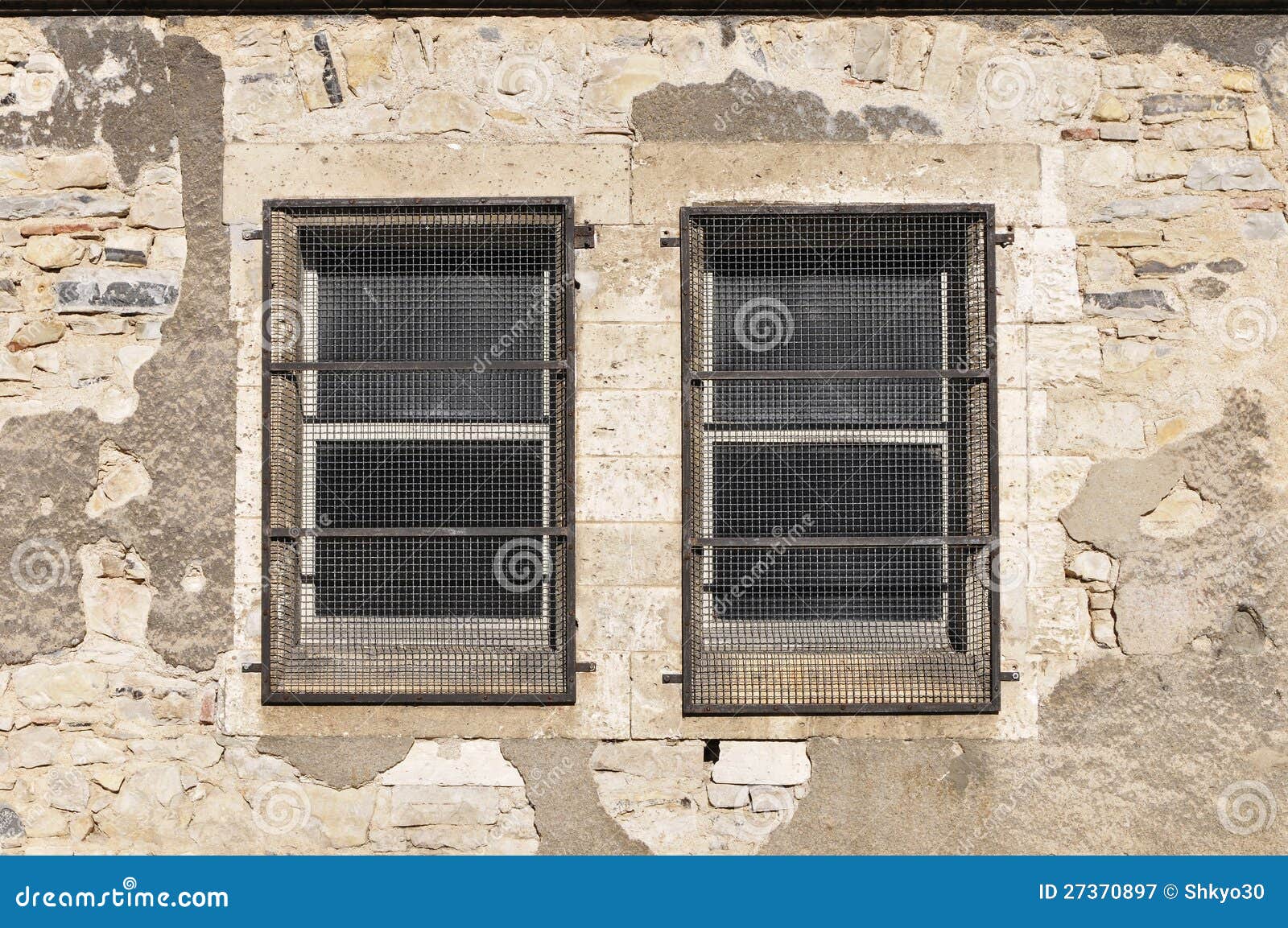 Two Little Windows with Metallic Protections Stock Image - Image of ...