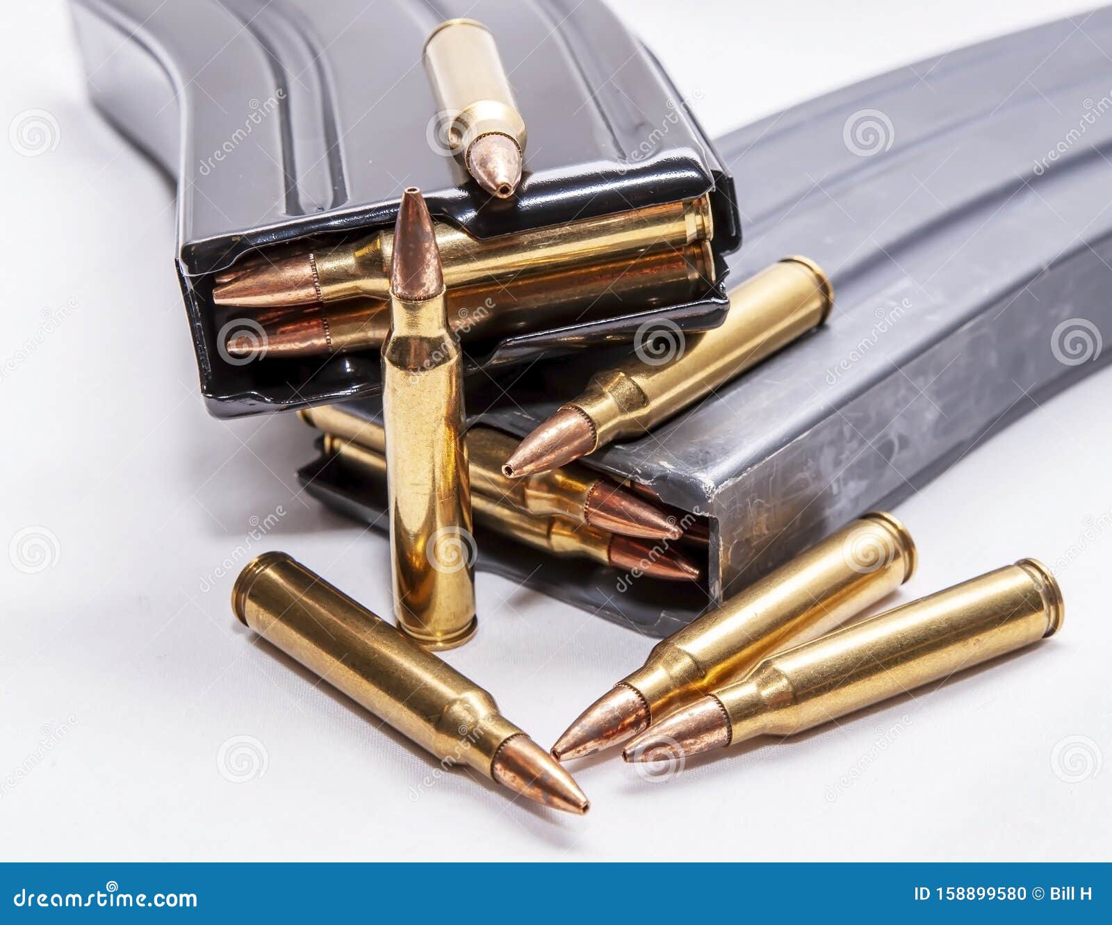 Ak-47 Rifle, Magazines And Ammunition Lying On A Blue-yellow Ukrainian ...