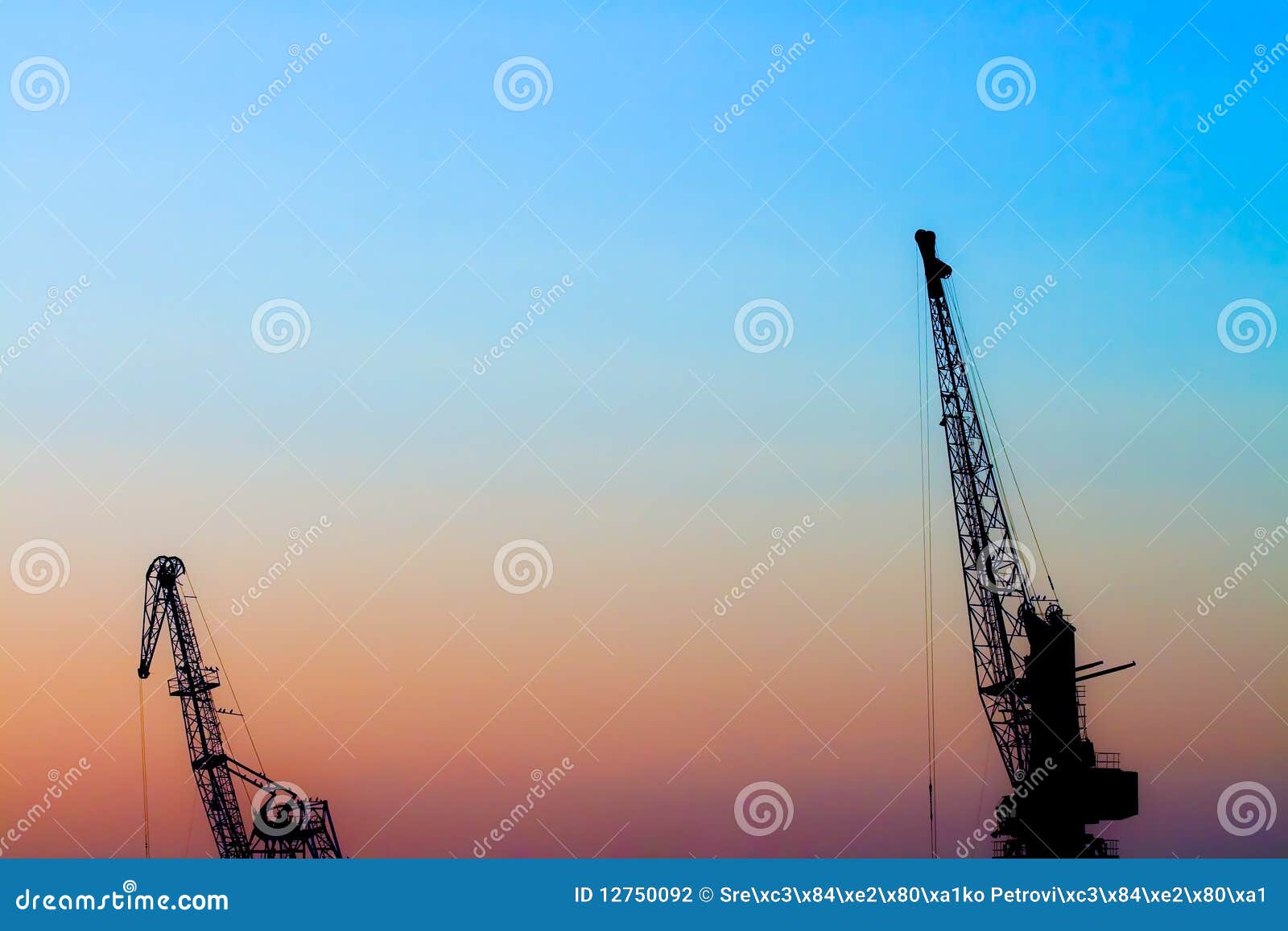 Two loading cranes stock photo. Image of industry, transportation ...