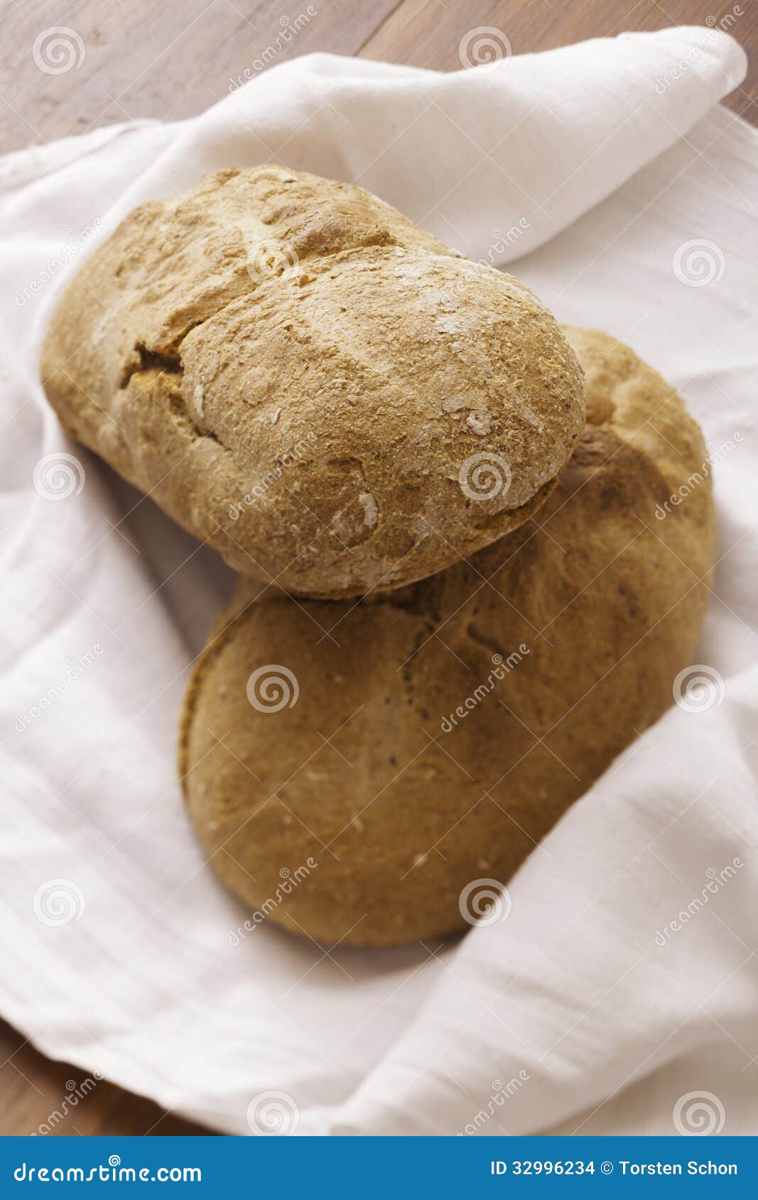 Two loaves of bread stock photo. Image of cloth, pastries - 32996234