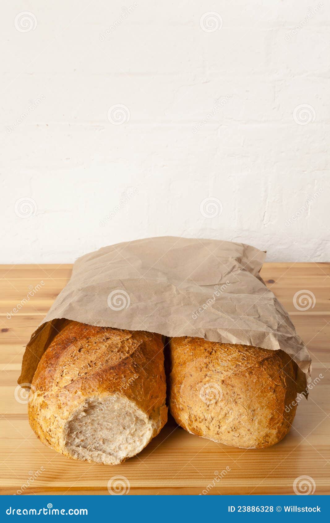 Two Loaves of Bread stock photo. Image of unsliced, wholewheat - 23886328