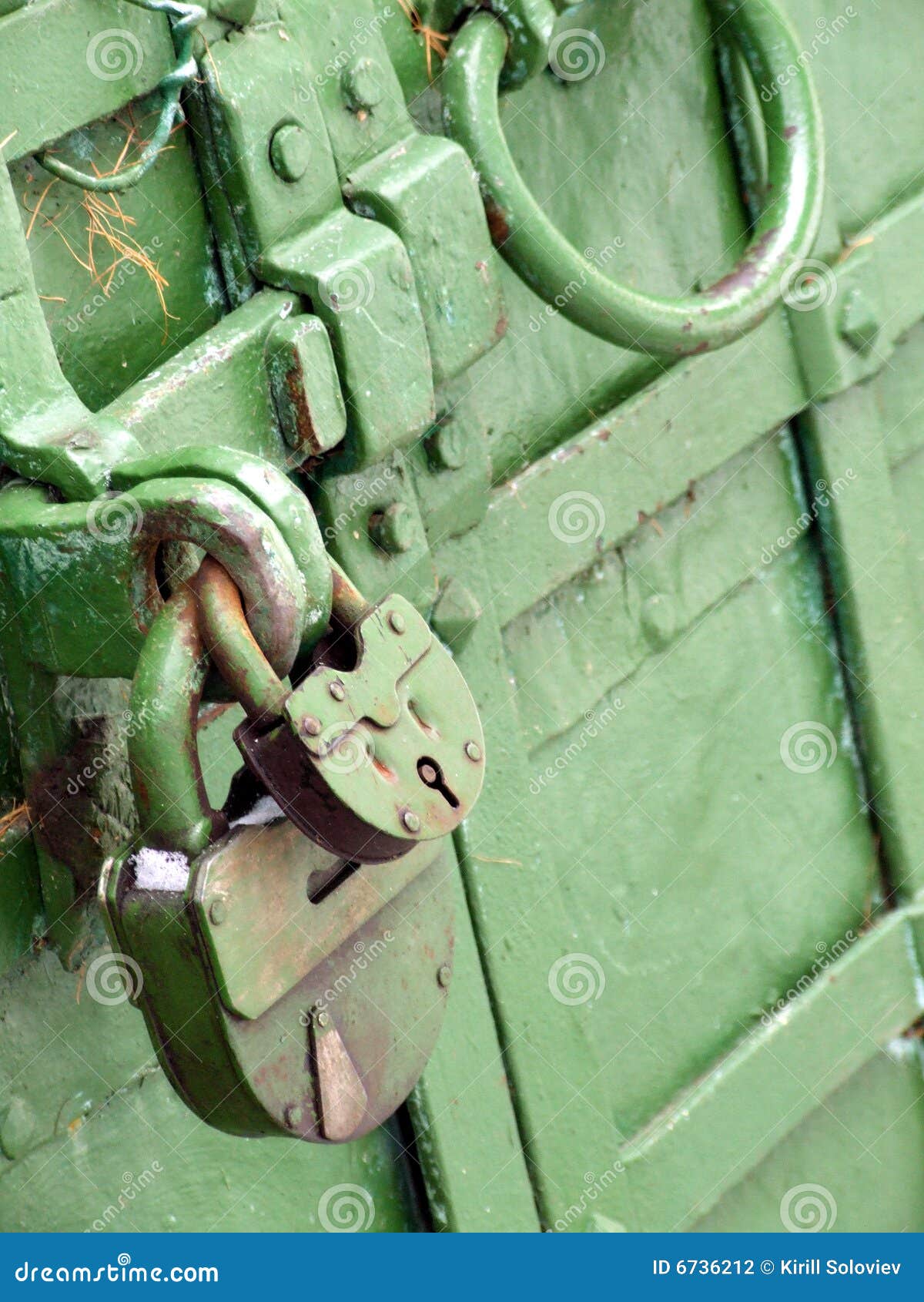 Two locks on a green door stock photo. Image of beaten - 6736212