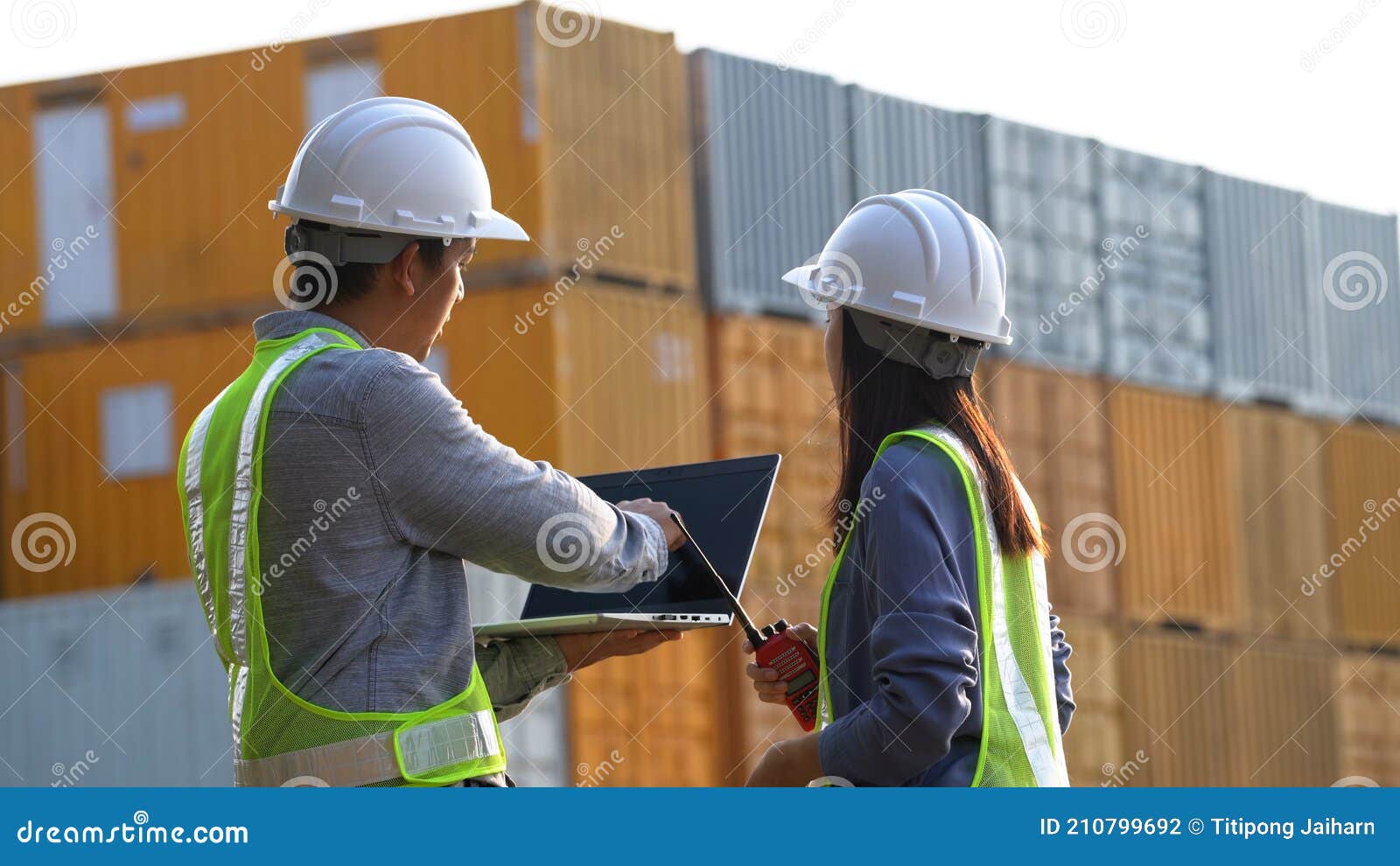 Two Logistic Staff Discussing while Checking and Control Loading ...