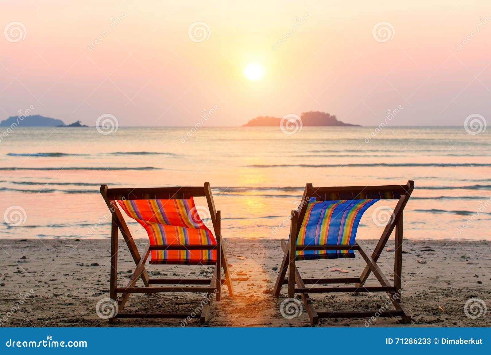 Two Lounge Chairs on Sunset Beach. Relax. Stock Image - Image of ocean ...