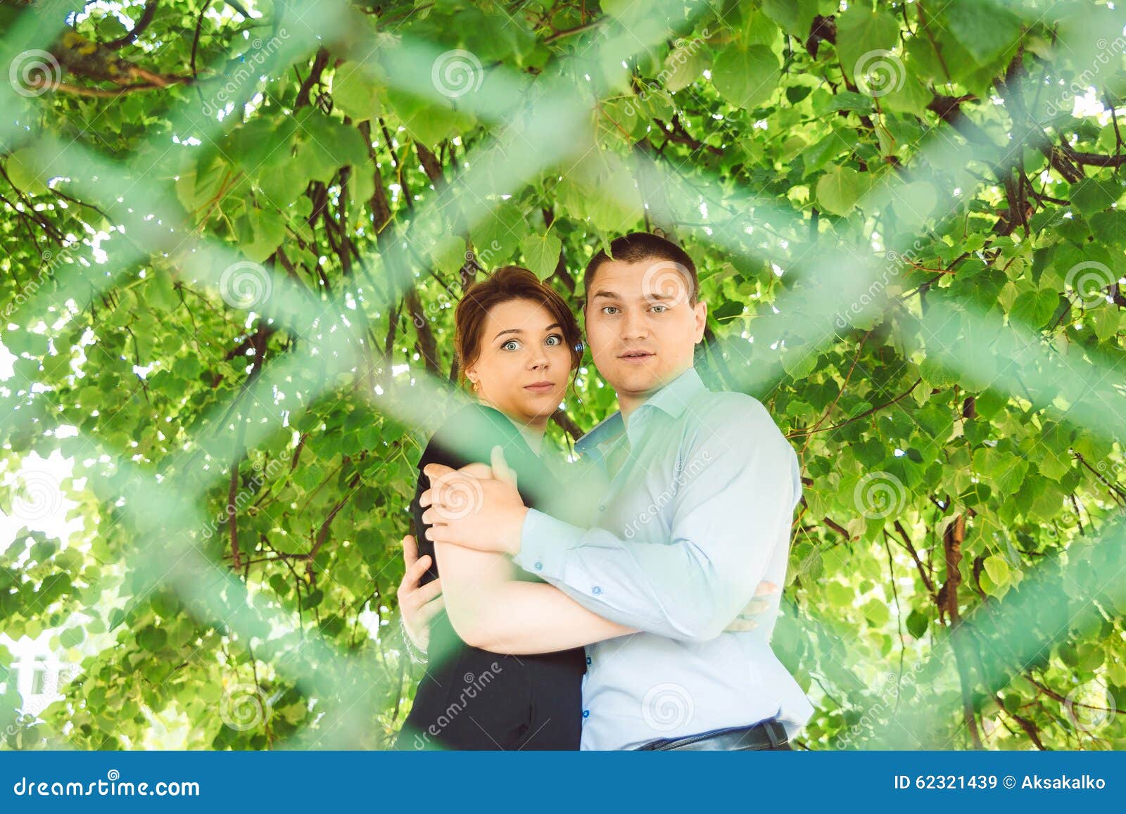 Two lovers kissing in park stock image. Image of casual - 62321439