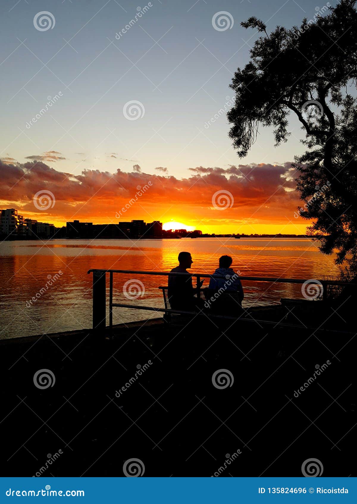 Two Lovers Looking at the City View during Sunset Stock Photo - Image ...