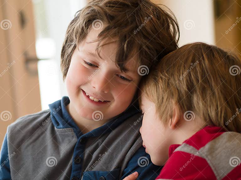 Two brothers hugging stock photo. Image of hugging, love - 30243060