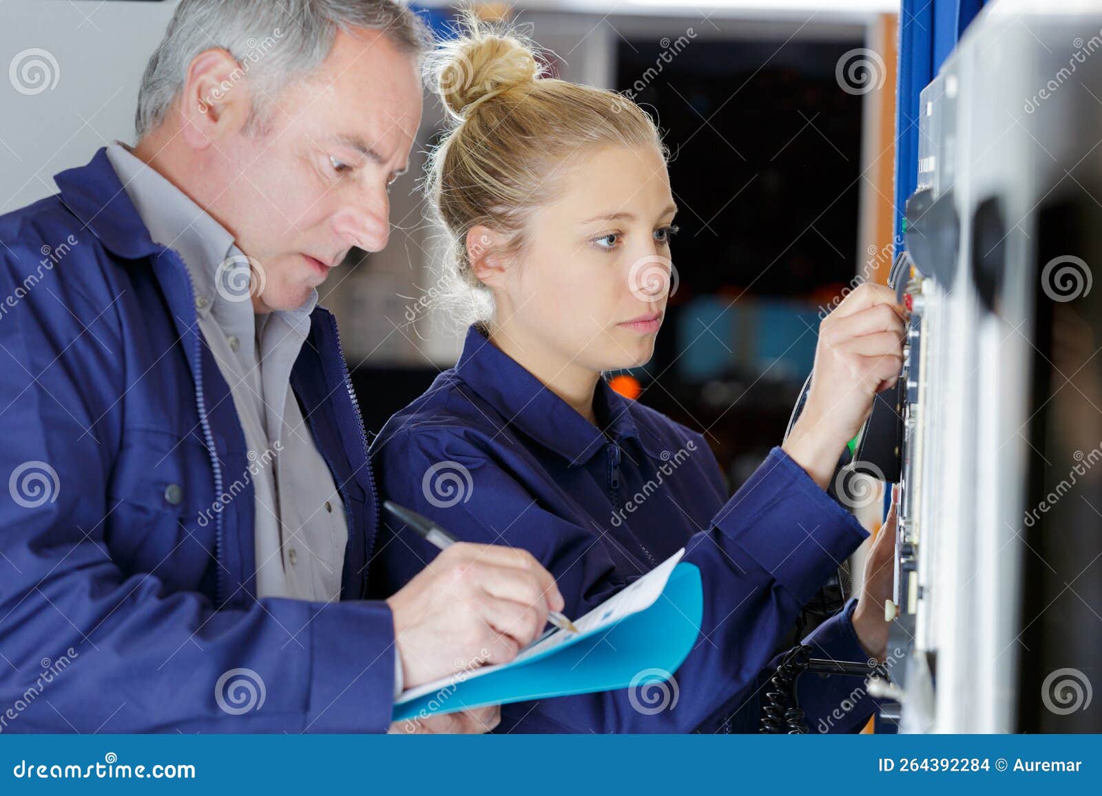 Two Machinists Working on Machine Stock Photo - Image of laborer ...