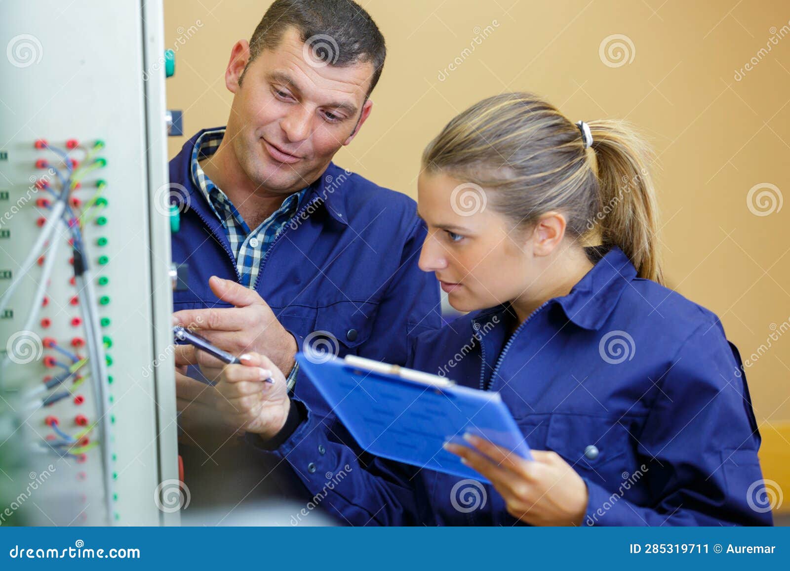 Two Machinists Working on Machine Stock Image - Image of machinist ...