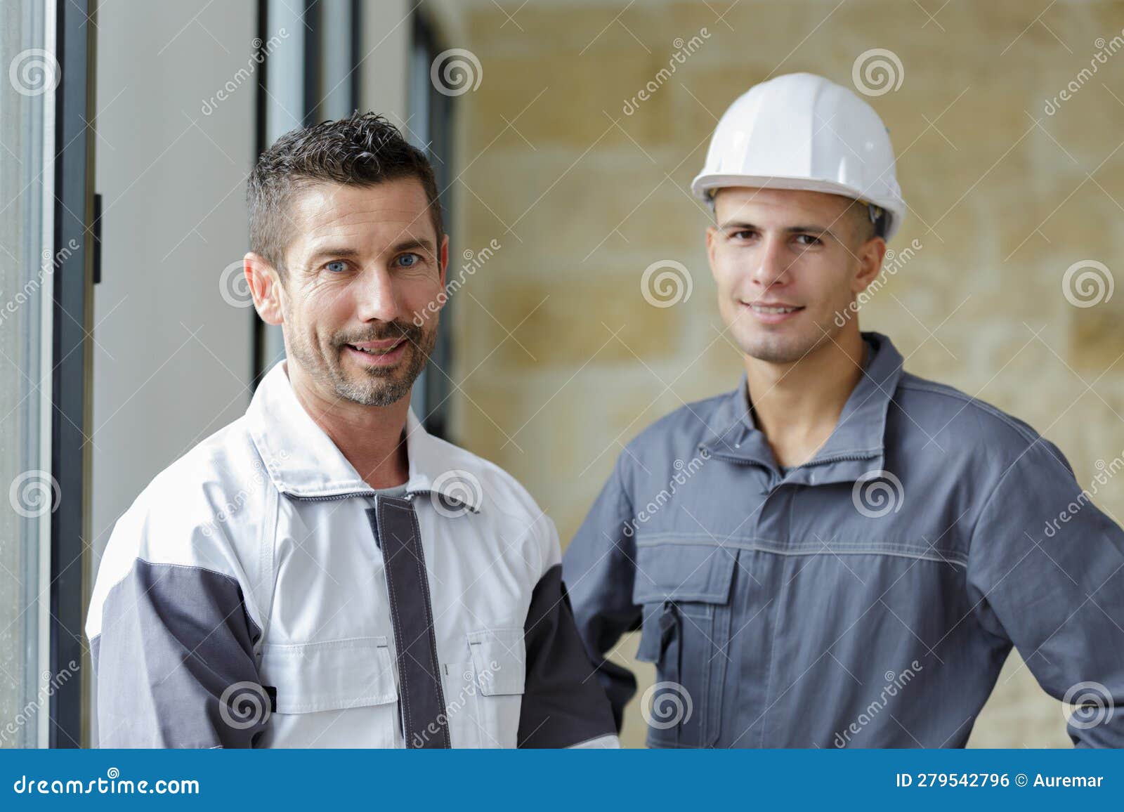 Two Male Builders Looking at Camera Stock Photo - Image of males ...